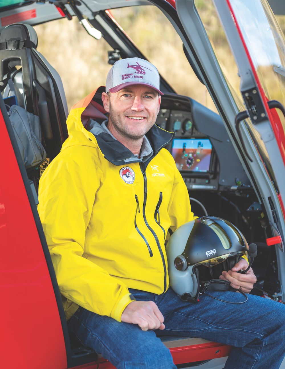 Search and rescue helicopter pilot Steve Wilson assists when boundary ...